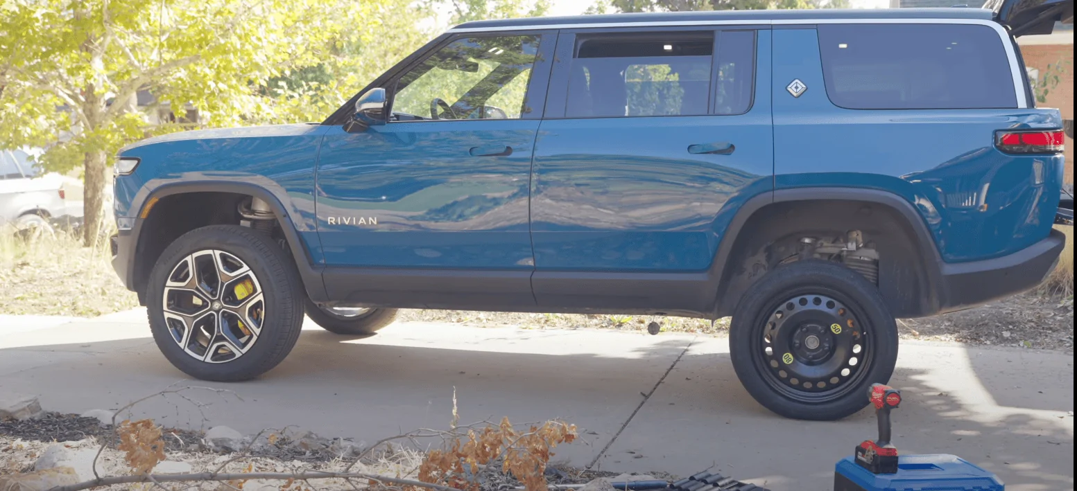 Rivian compact spare inflated & installed in glowing R1S review video ...