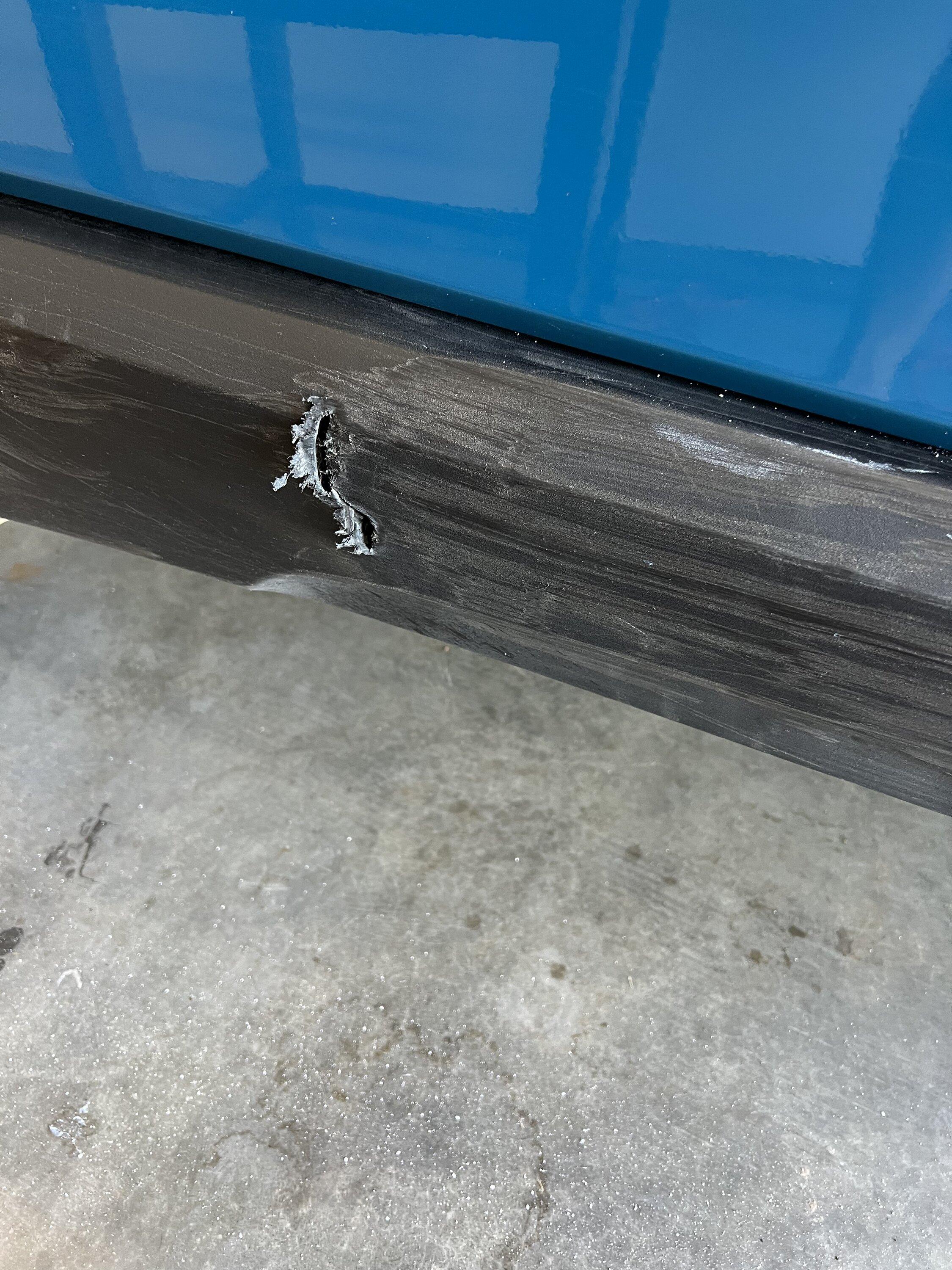 Fresh battle scar to my R1T from overlanding/off-roading weekend ...