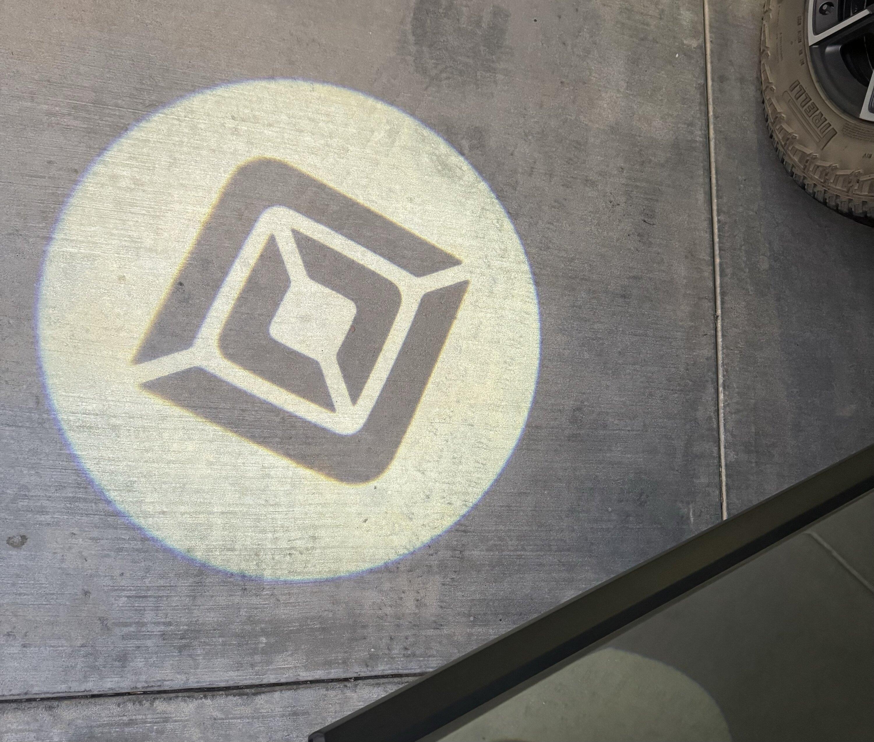 Puddle lights with compass logo virtual in 360° view? | Rivian Forum ...