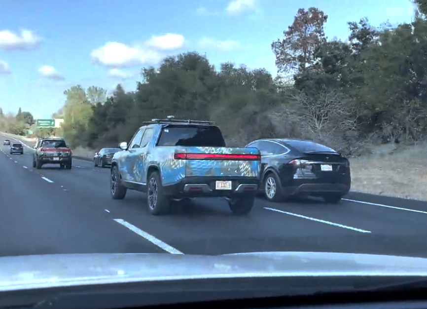 Two Rivian R1T spotted driving next to Model X | Rivian Forum - R1T R1S ...