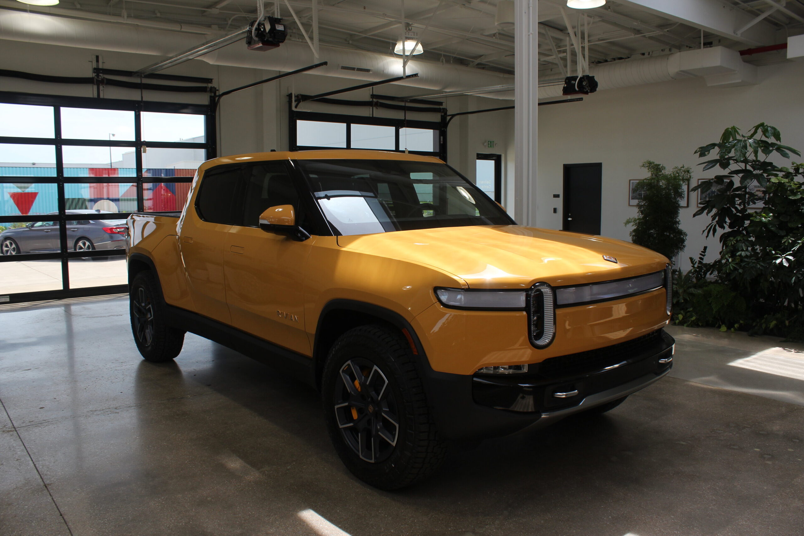 First looks from factory delivery of Compass Yellow R1T | Rivian Forum ...