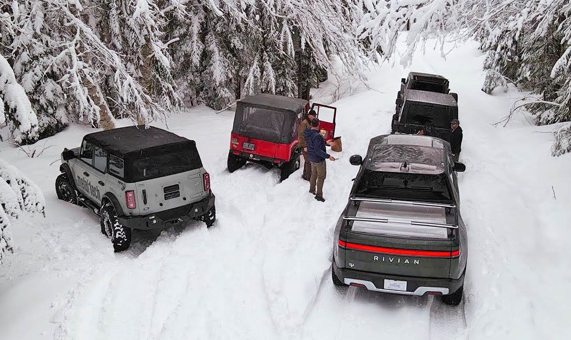 Rivian R1T, Bronco, FJ40, and Jeeps off-road through deep snow in ...