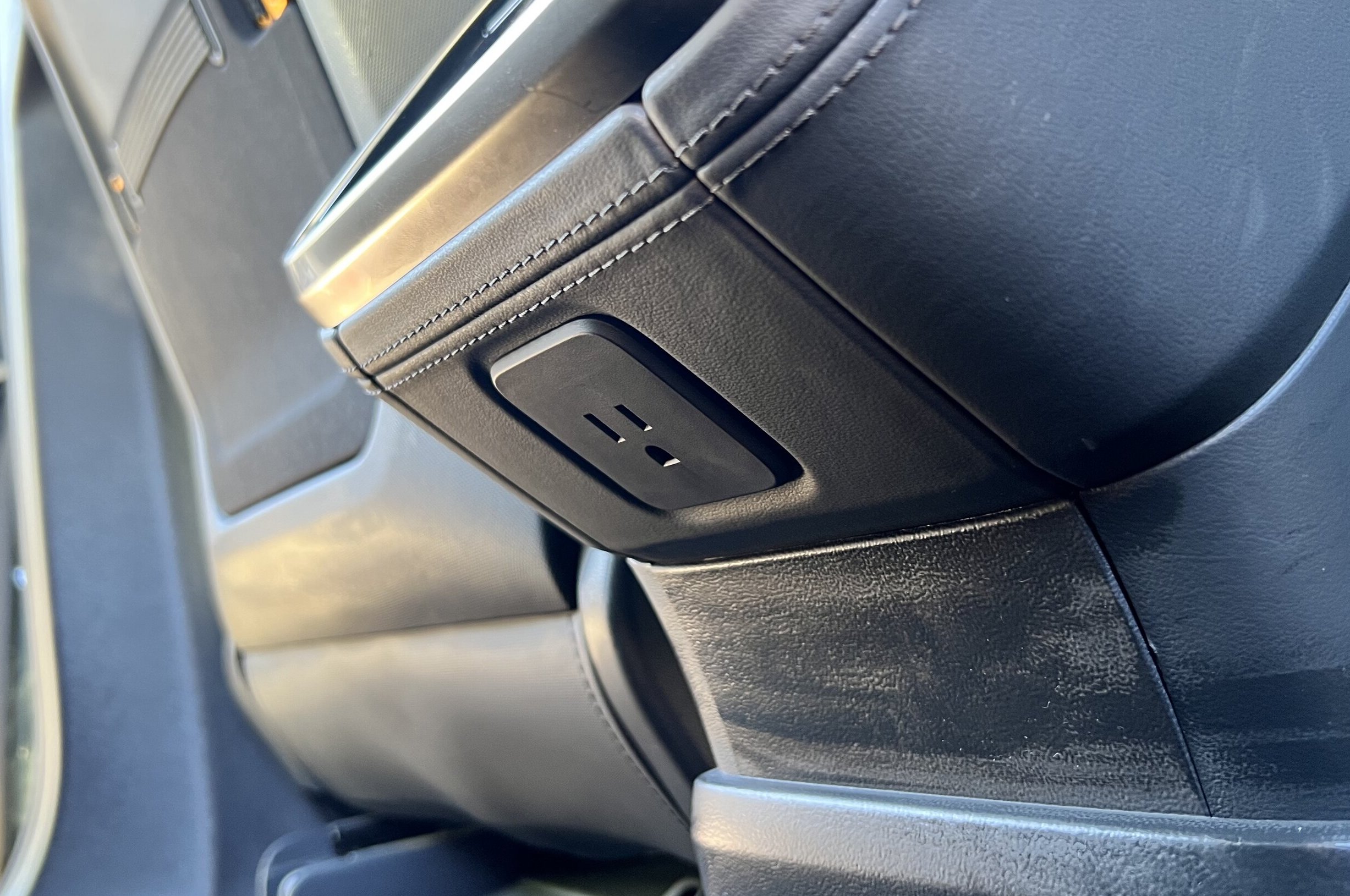 110V outlet inside the cab (under rear HVAC control screen)! | Rivian ...