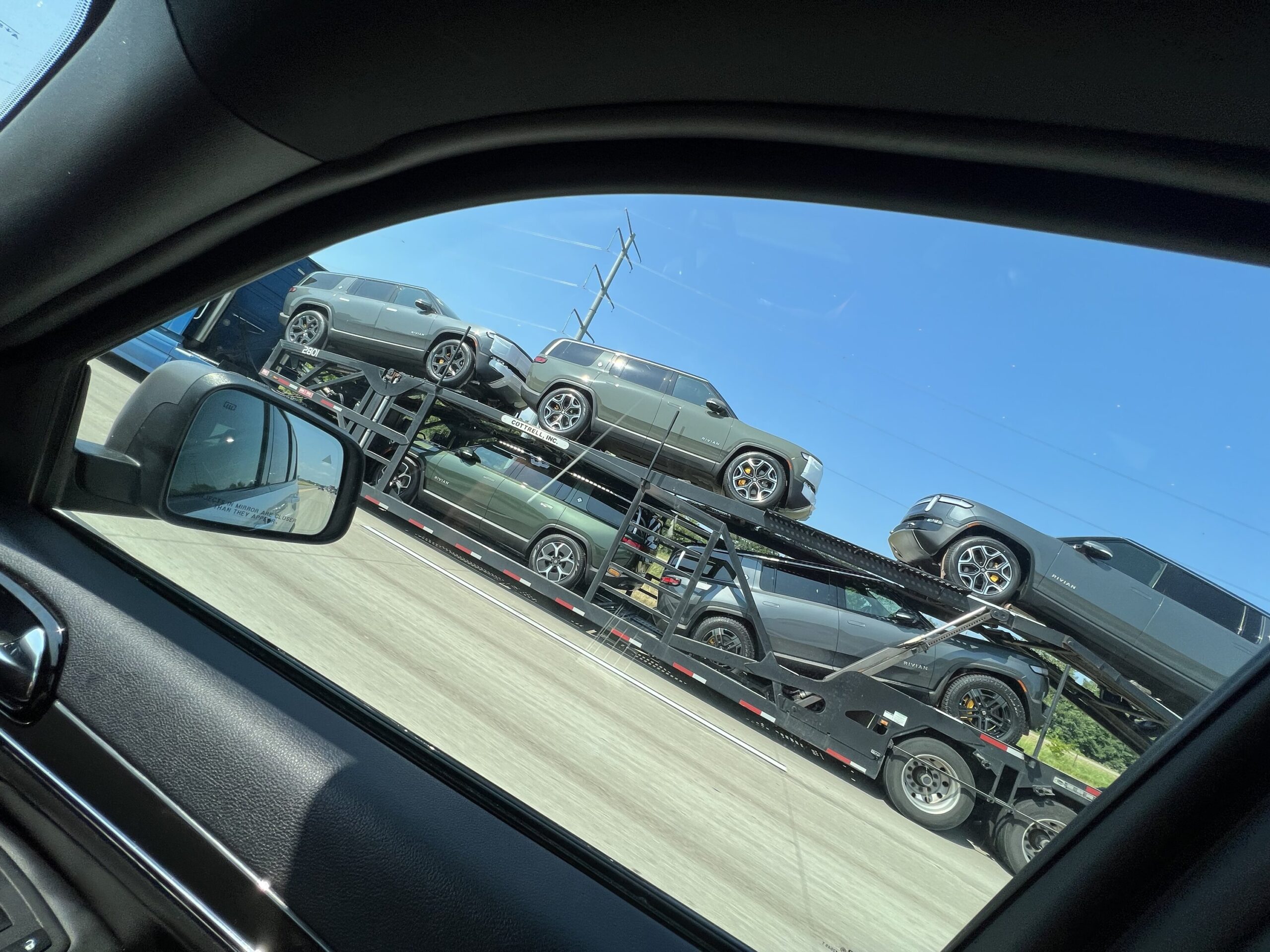 Lots of R1S's spotted being delivered to Minneapolis Service Center ...