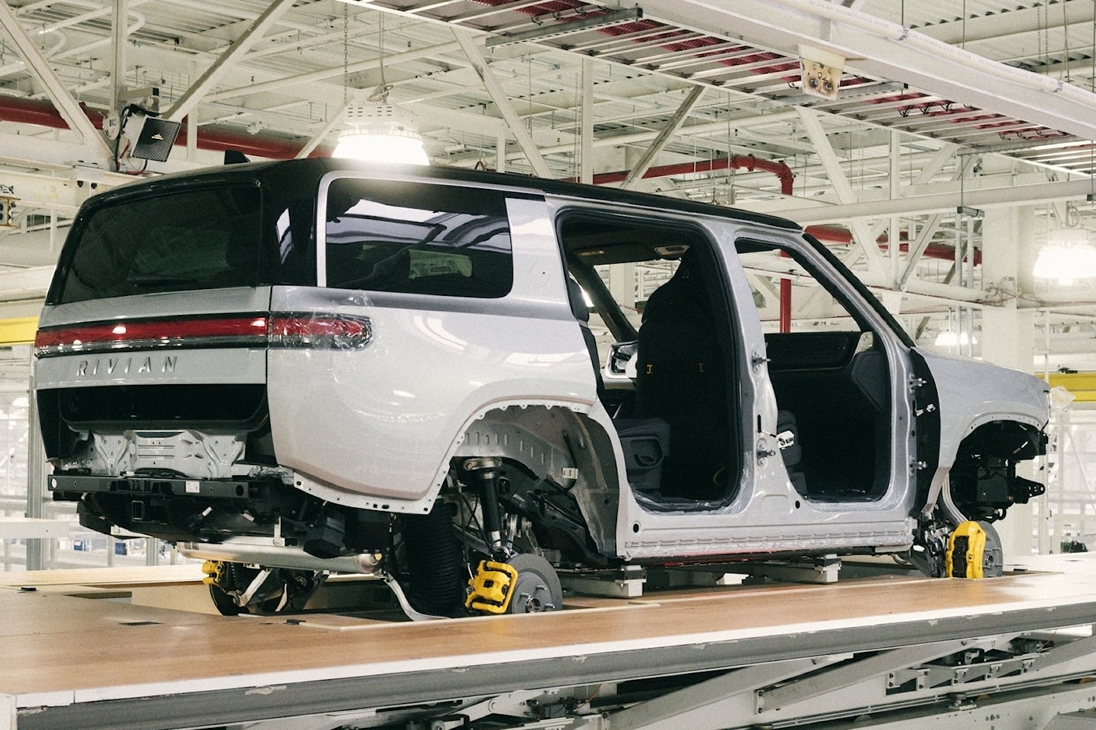 Forbes: Rivian’s Happy Predicament: R1S SUV Demand Surges But Wait Can ...