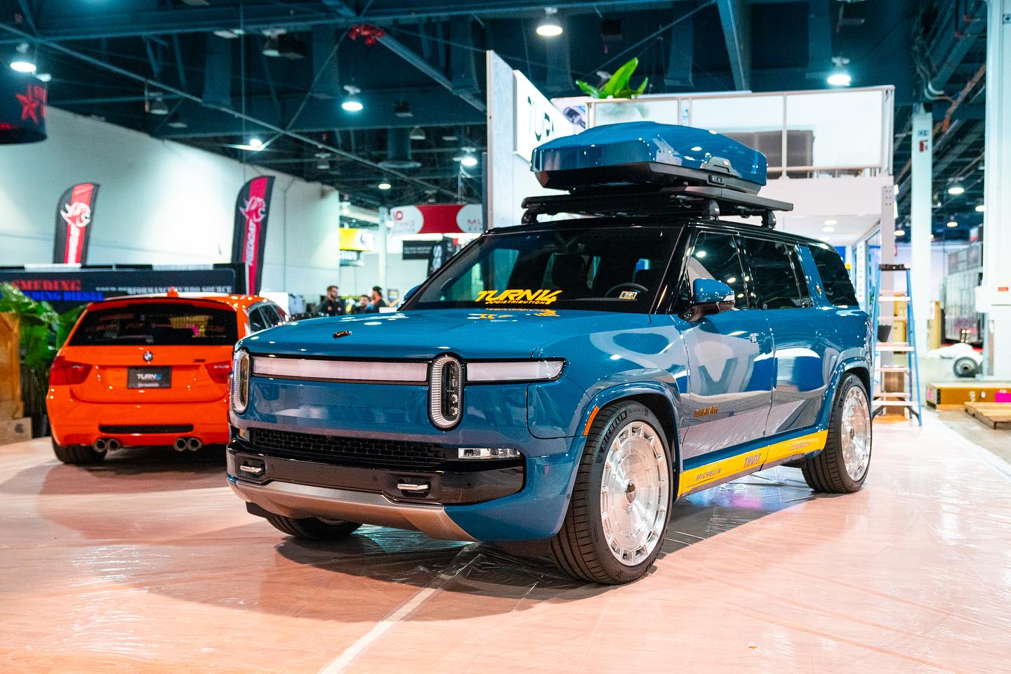 Lowrider Rivian R1S Build w/ Roof Rack and Cargo Box by Turn14 at SEMA ...