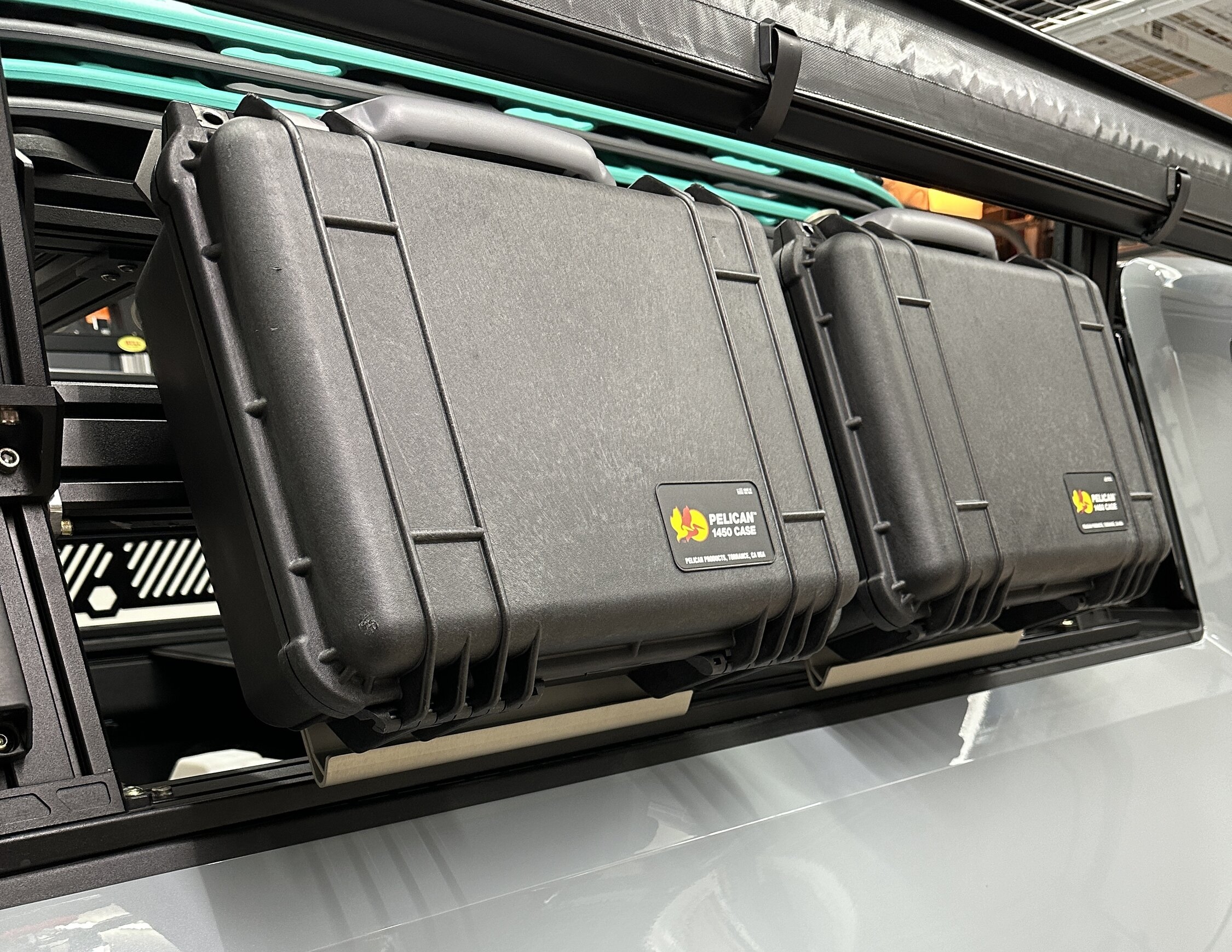 The Mounting Company's Pelican Boxes mounted on Xtrusion Overland Bed ...