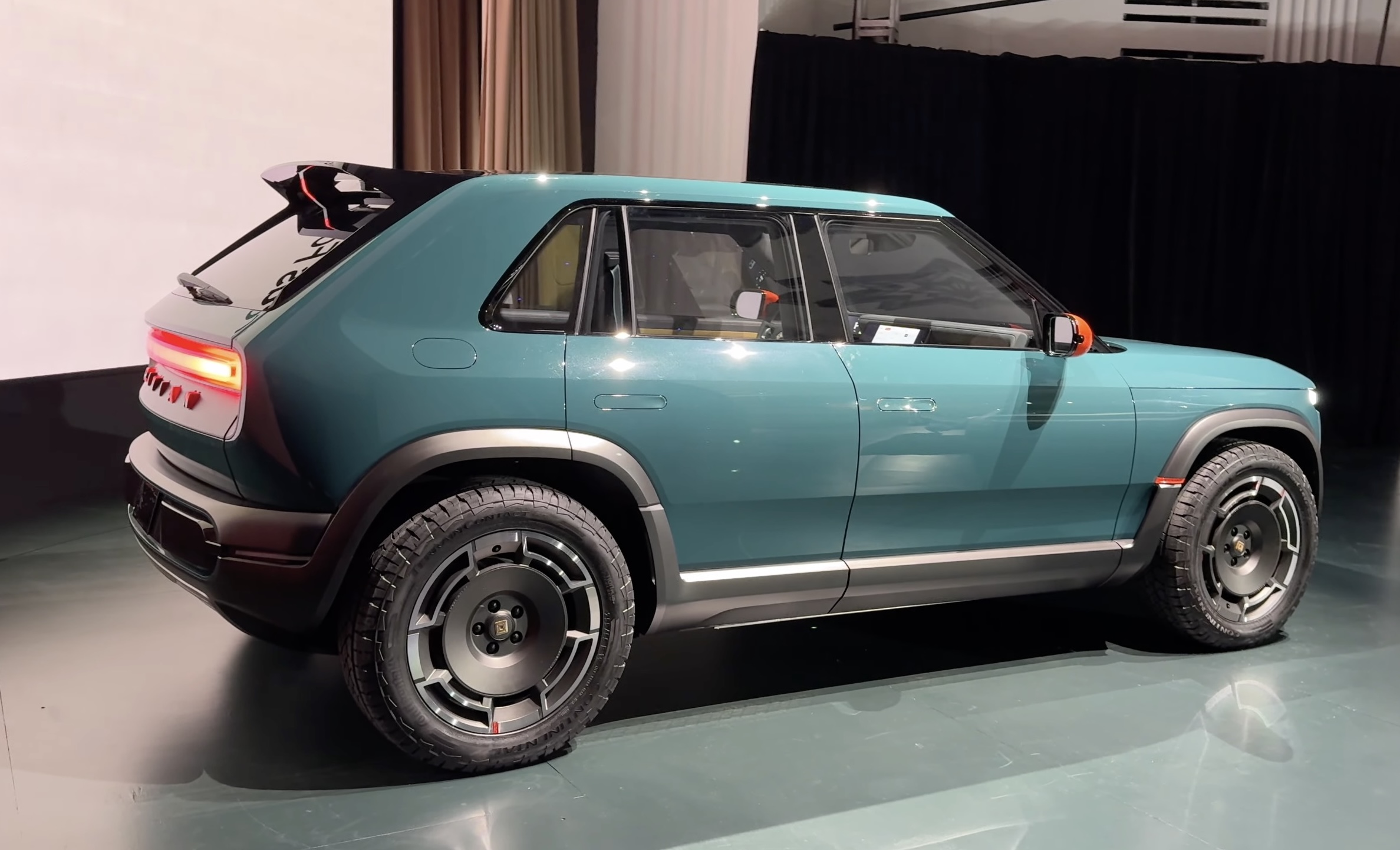 R3 lower price and smaller than R2 (5" shorter wheelbase). R3X is wider ...