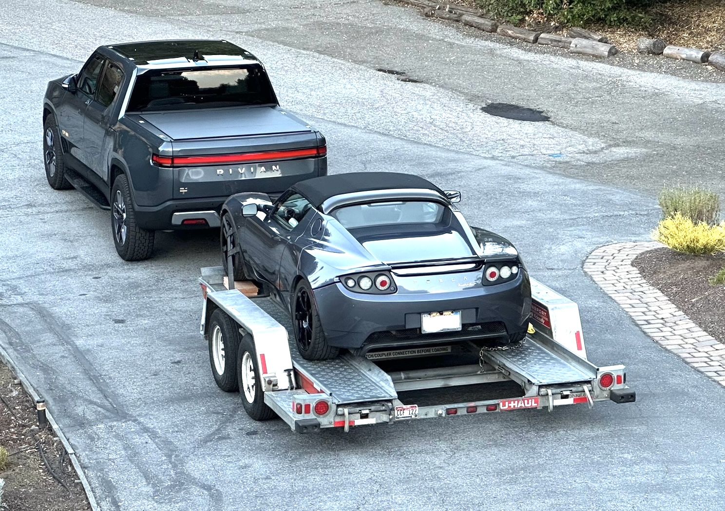 Sometimes you have to give a Tesla a lift / tow ... | Rivian Forum ...