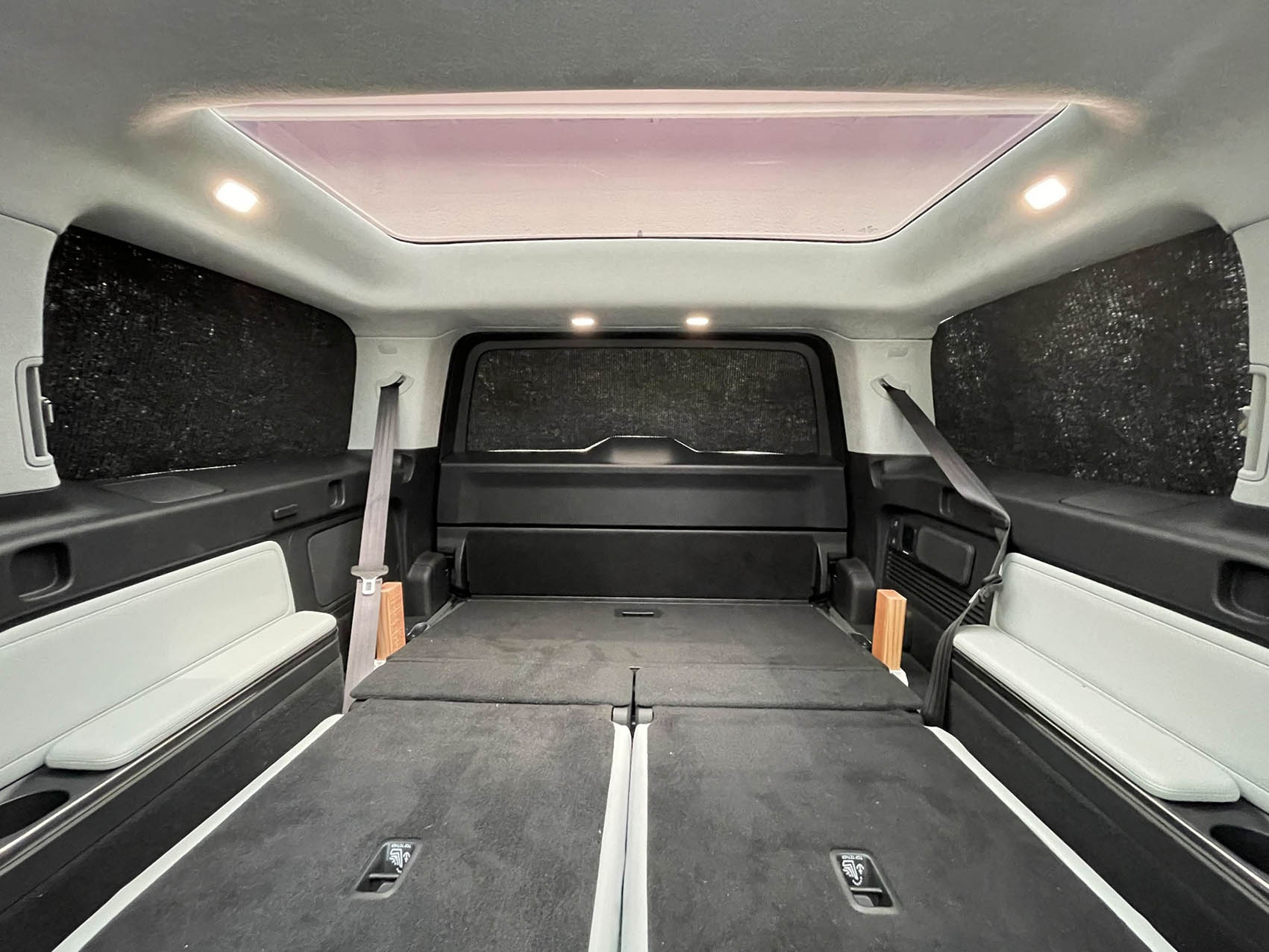 Made DIY black-out window shades for camping in my R1S. | Rivian Forum ...