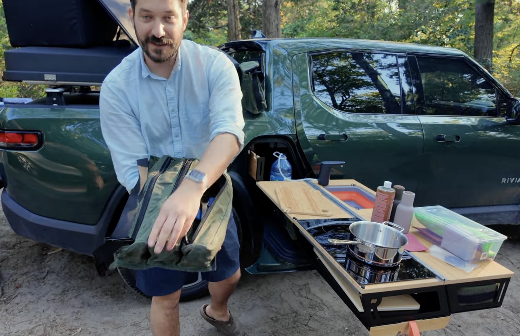 R1T camping & cooking adventure featuring gear tunnel Thunderbolt Camp ...