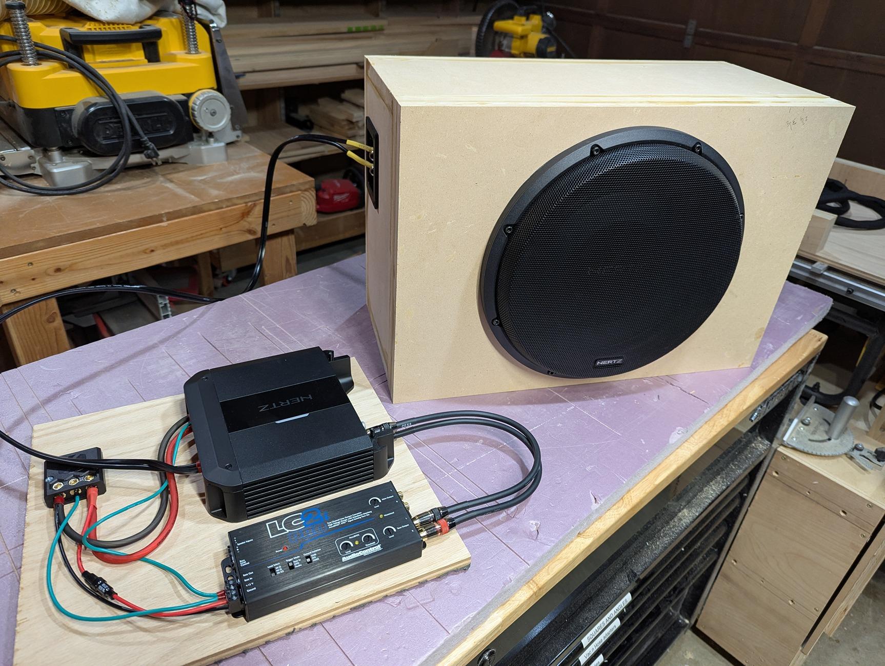 Gen 1 R1T aftermarket subwoofer box install in gear tunnel | Rivian ...